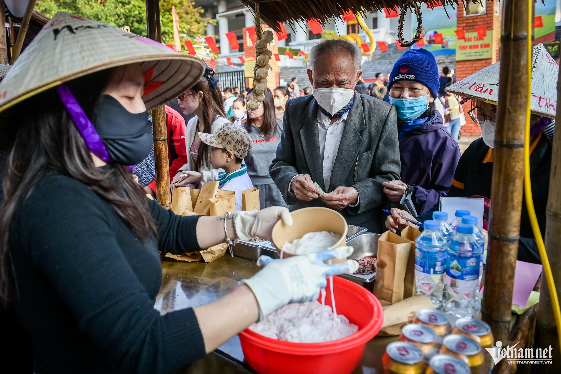 Thousands of people crowded together to enjoy the food at the Noodle ...