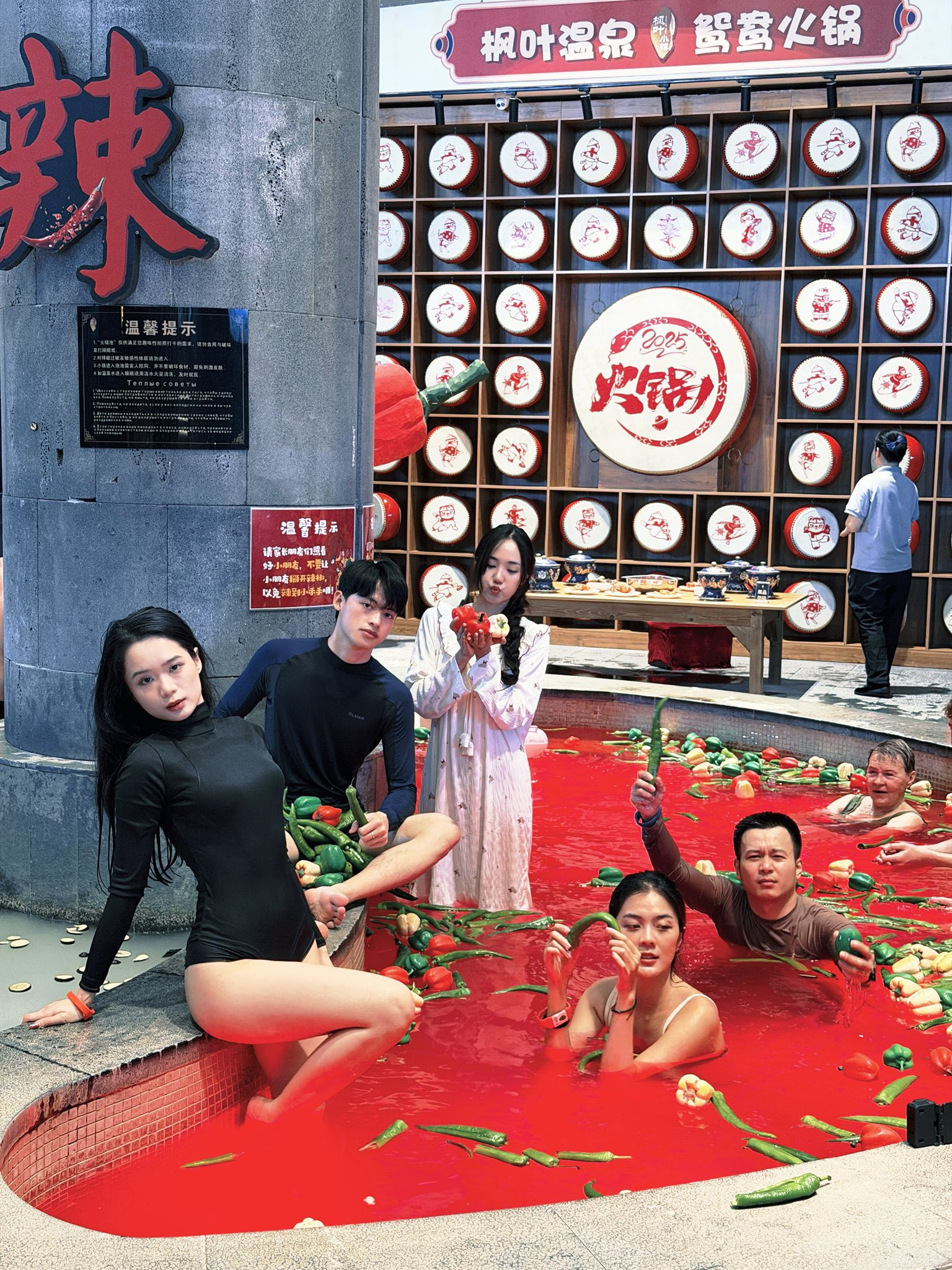 Vietnamese tourists bathe in a giant 'hot pot' full of chili peppers ...