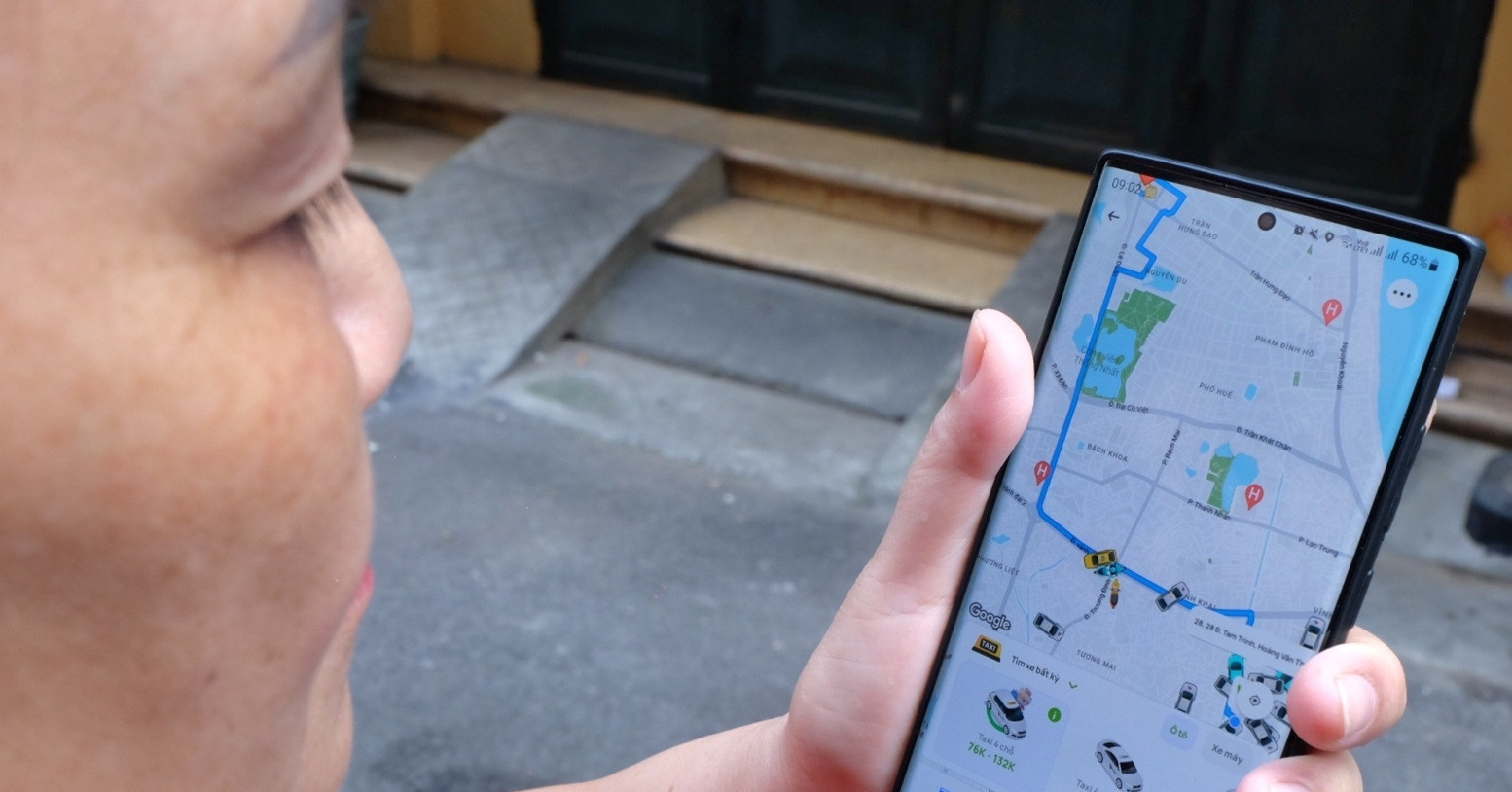 Traditional taxi firms digitize services to be more competitive