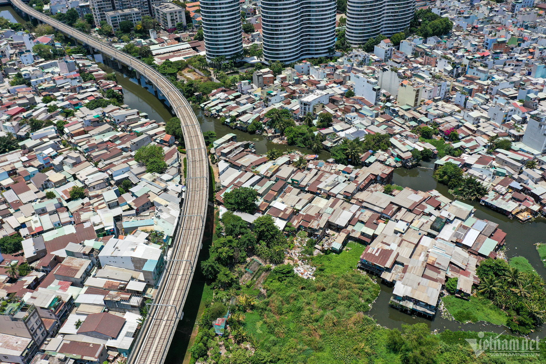 Living in the shadows: Slums beneath HCM City's skyscrapers