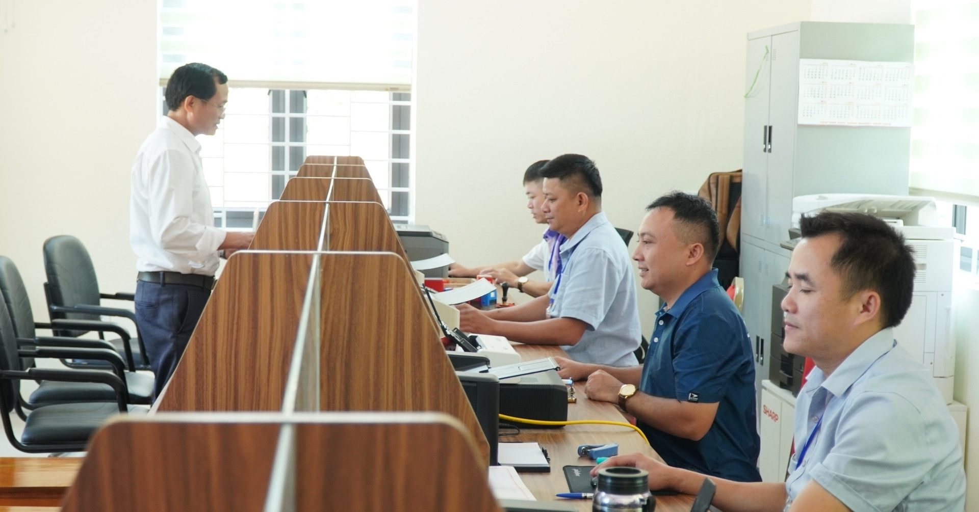 Two-tier government reform to gain momentum after transition period: expert